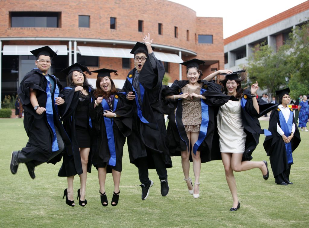 chinese students celebrating curtin university graduation 1